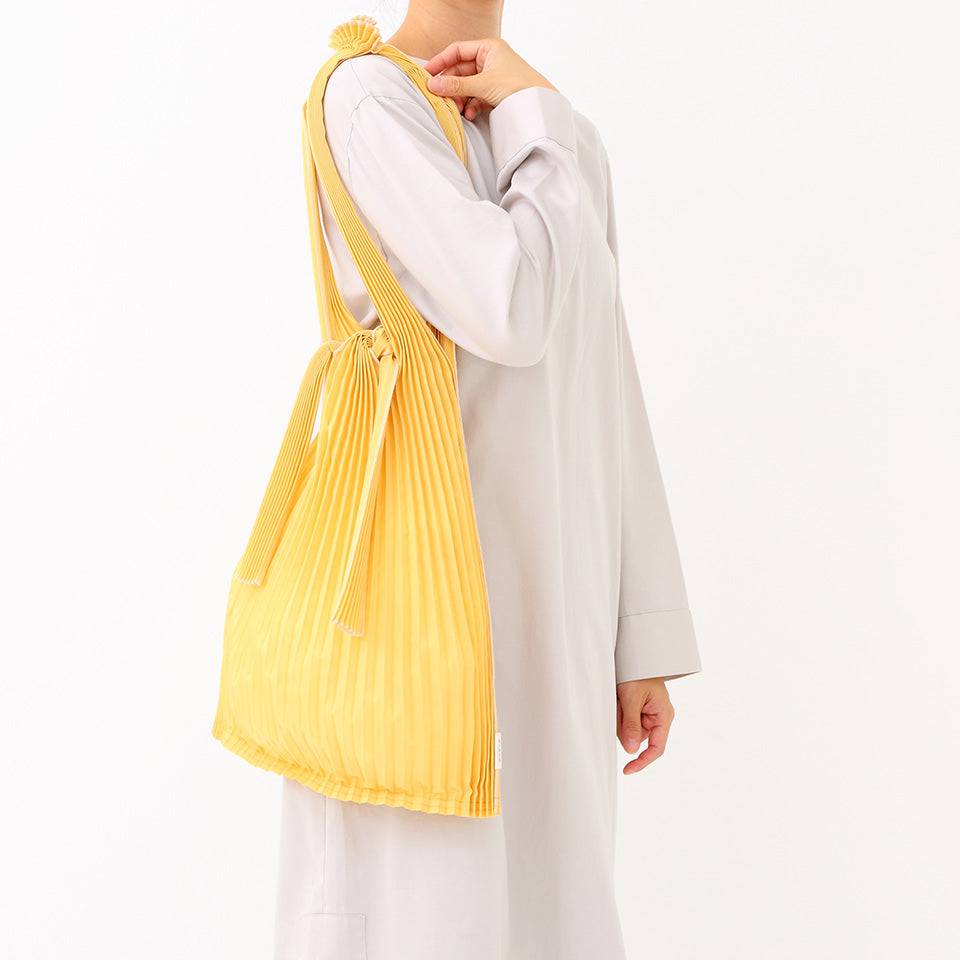 Kna Plus - PLECO Vertical Pleats Bag Large – Here.